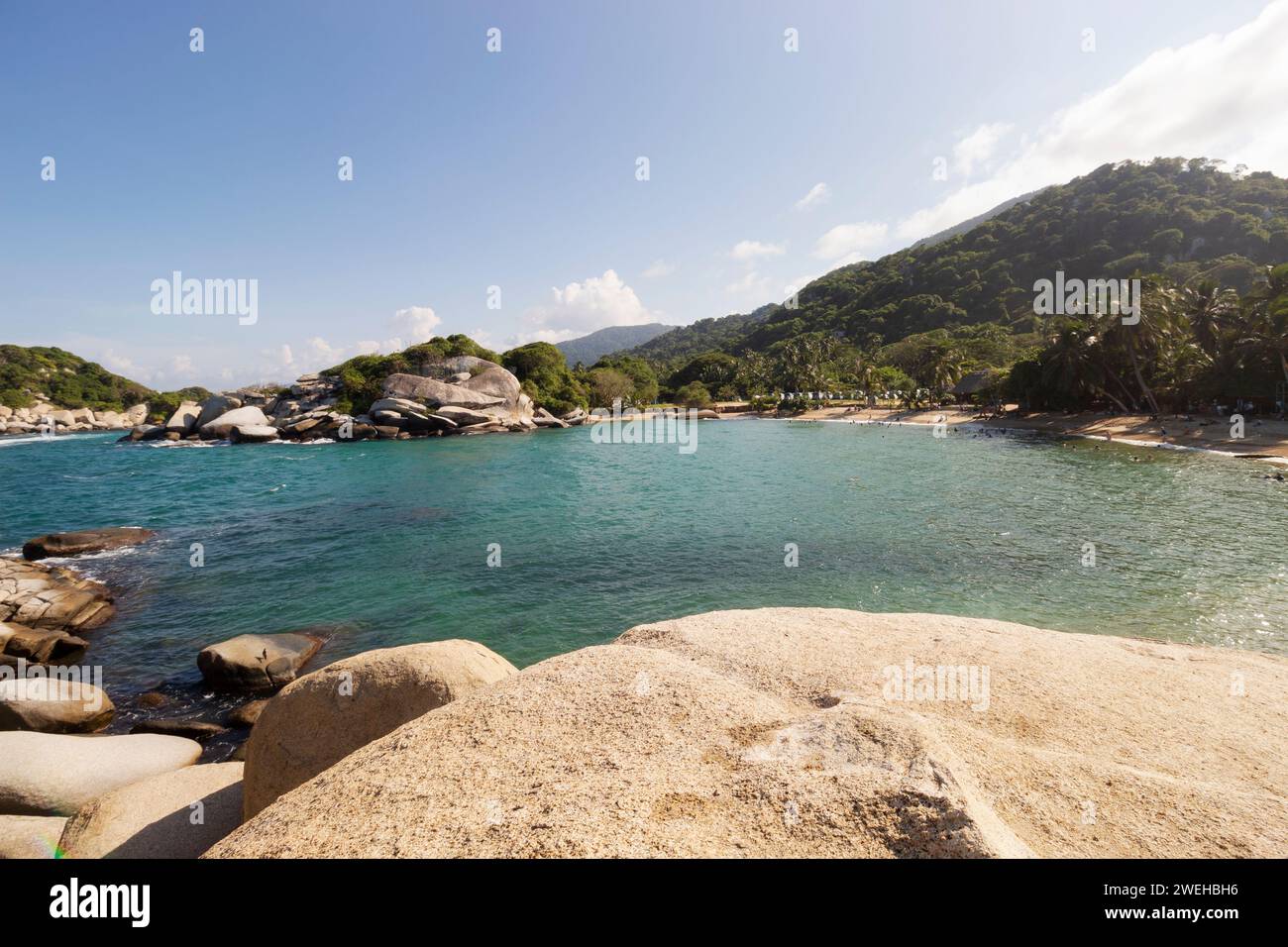 Beautiful colombian caribbean beach sunset scene viewed from a big rock ...