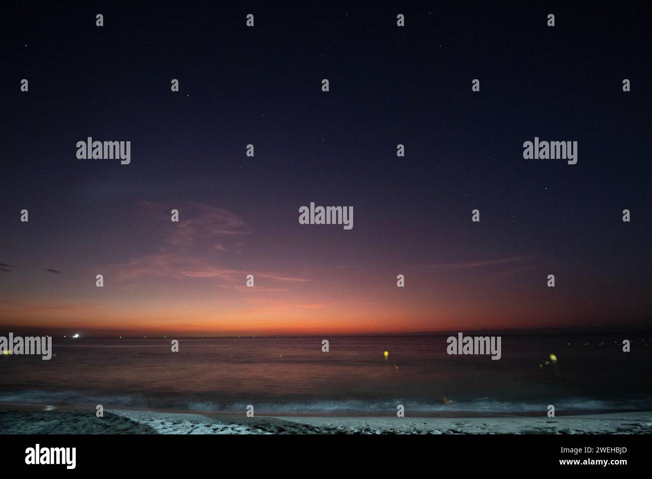 Beautiful starry dawn landscape beach Stock Photo - Alamy