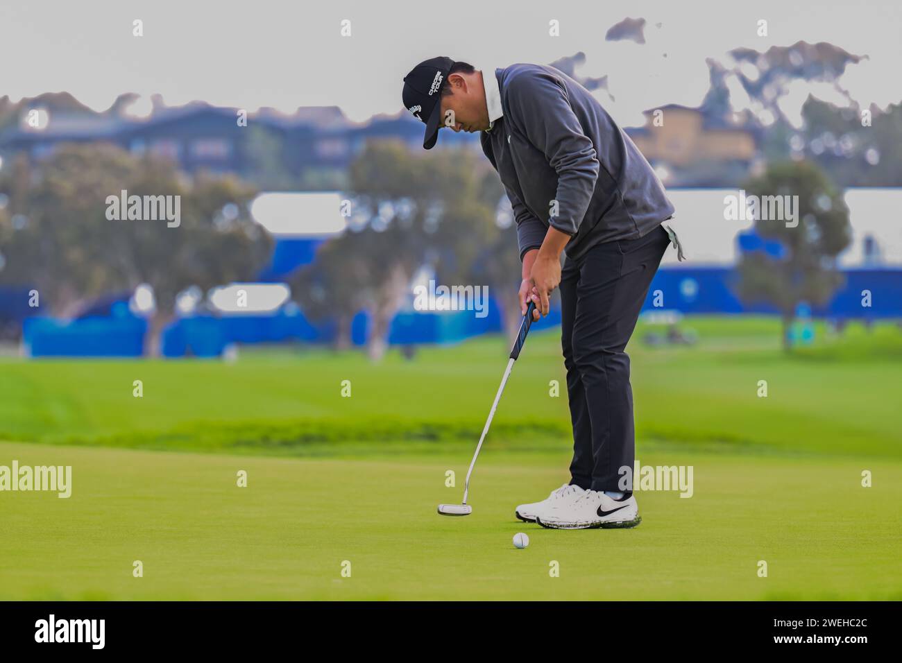 San Diego, California, USA. 25th Jan, 2024. Kevin Yu putts on the 1st ...