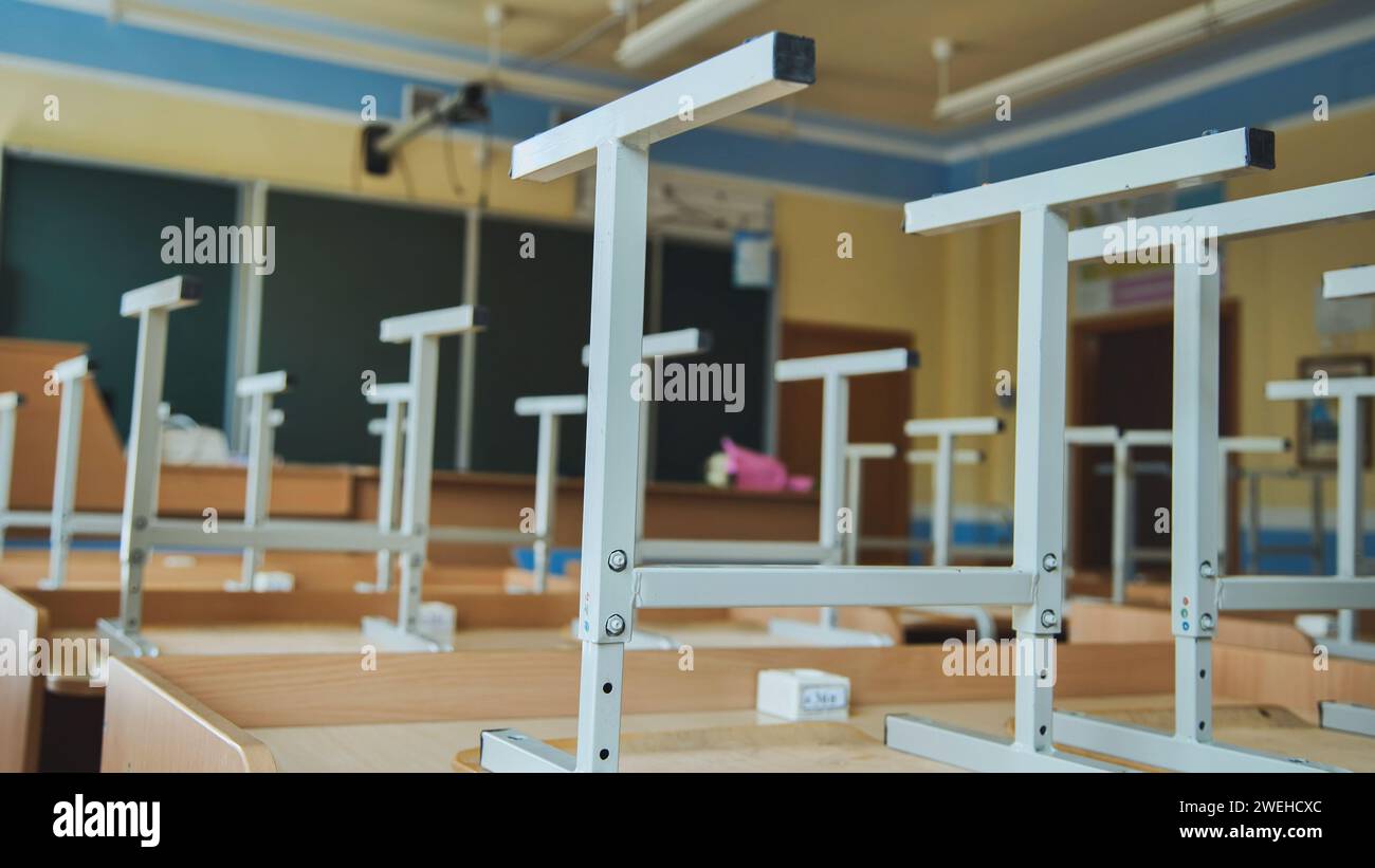 The concept of graduating from high school. Upside-down chairs in an ...