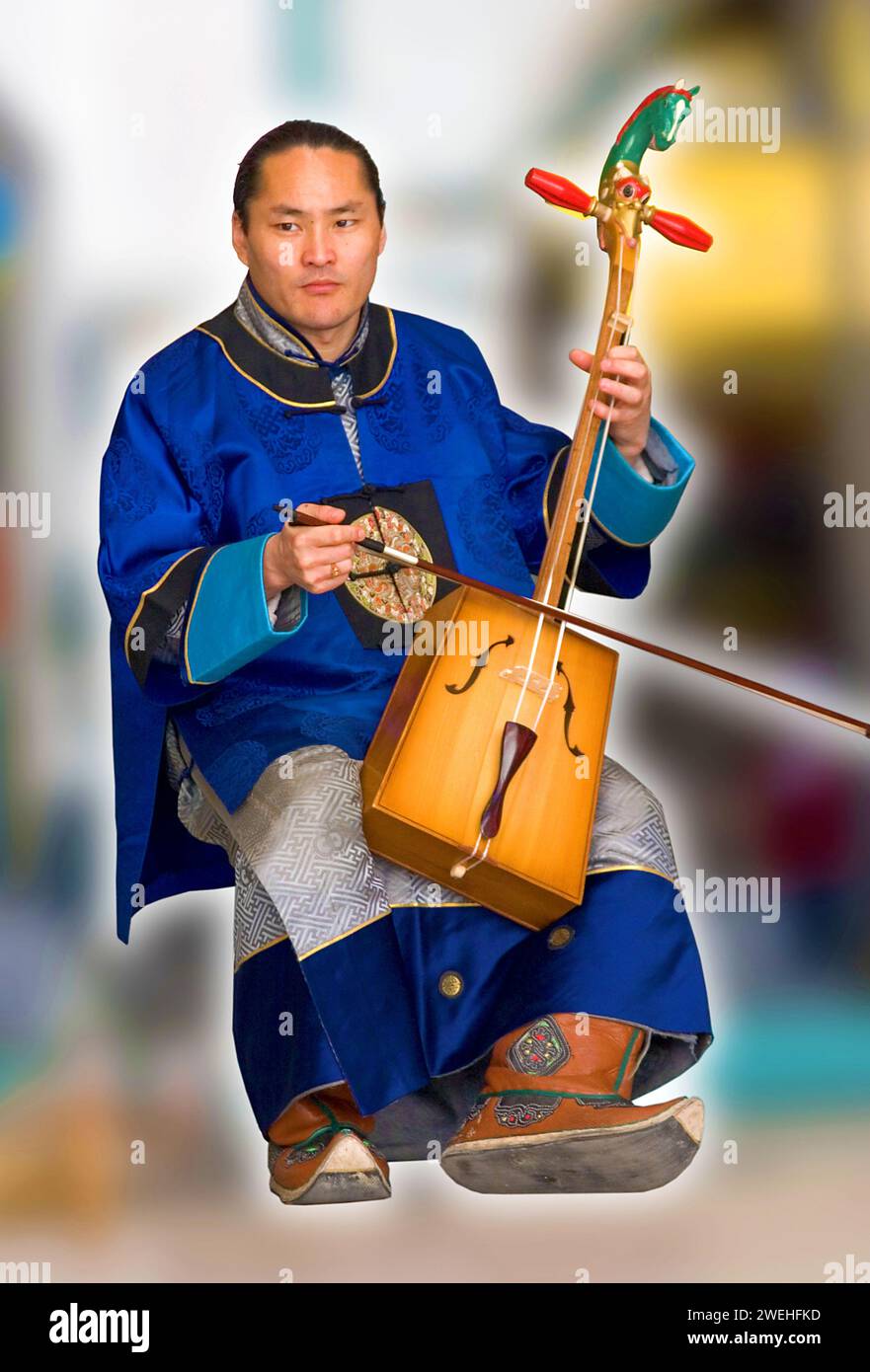 a musician from Mongolia with a Morin Khuur instrument and in colourful ...