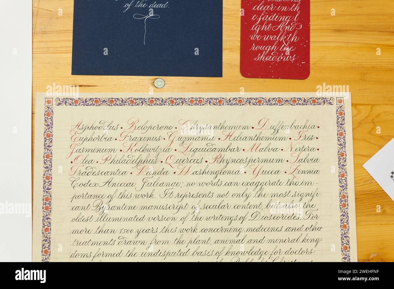 Top view of calligraphy sheets on a kraft background. Concept of ...