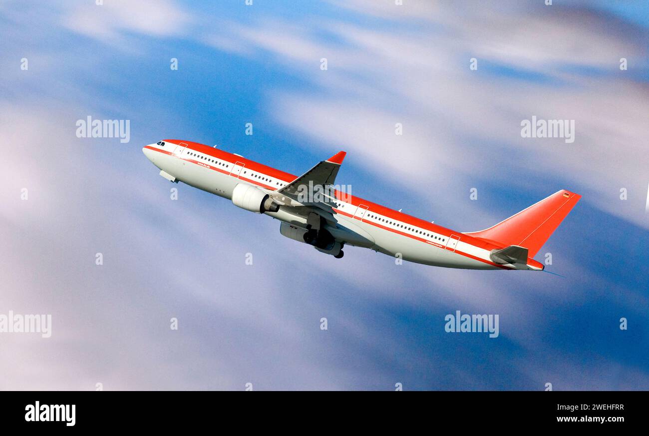 a red and white passenger plane shortly after take-off, blurred ...