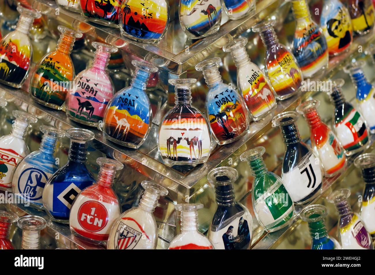 Dubai, United Arab Emirates - January 9 2024 Bottles of colorful sand ...