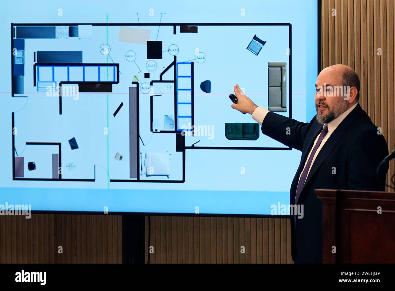 New Hampshire Senior Assistant Attorney General Ben Agati shows the ...