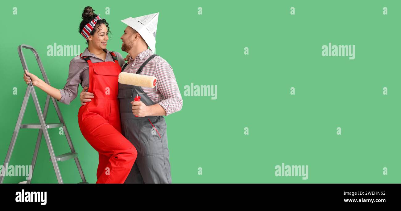 Young couple during painting of wall at home. Banner for design Stock ...