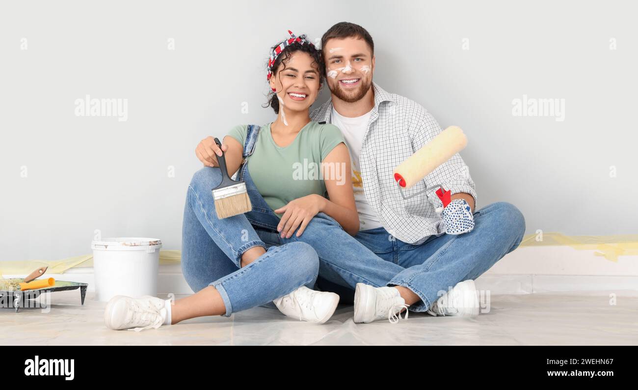 Woman long roller painting hi-res stock photography and images - Alamy