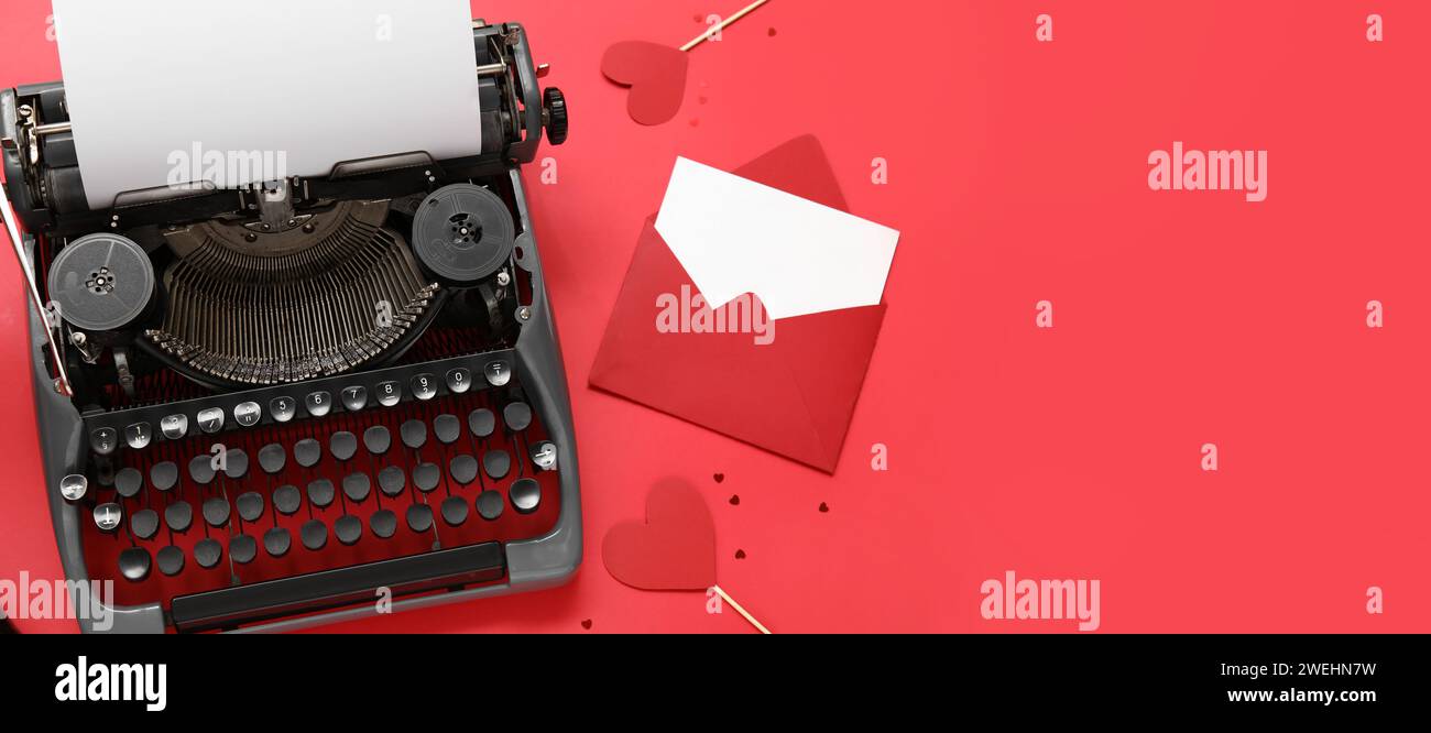 Vintage typewriter, letter and decor for Valentine's day on red ...