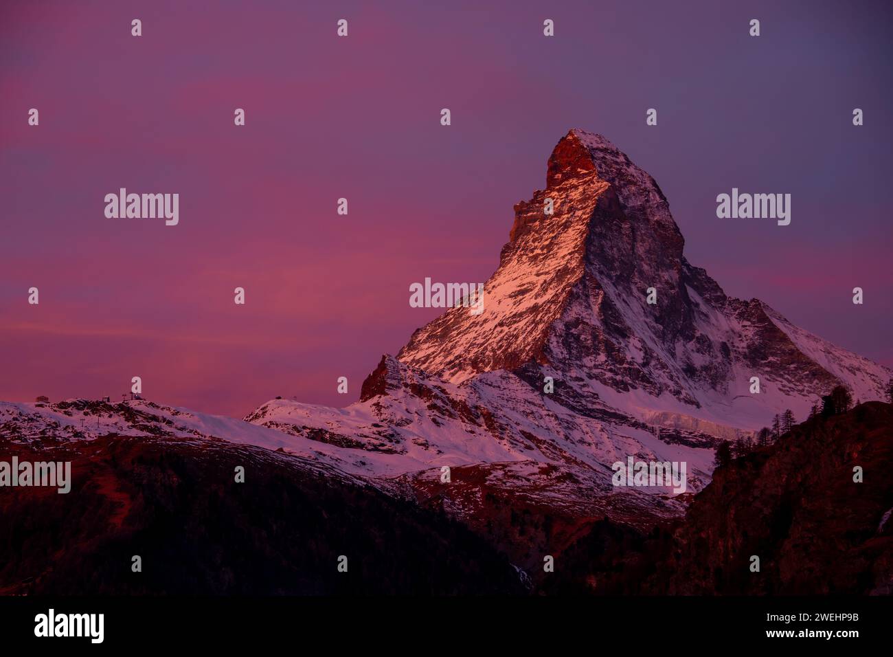 Early morning alpenglow light on the Matterhorn, famous and iconic ...