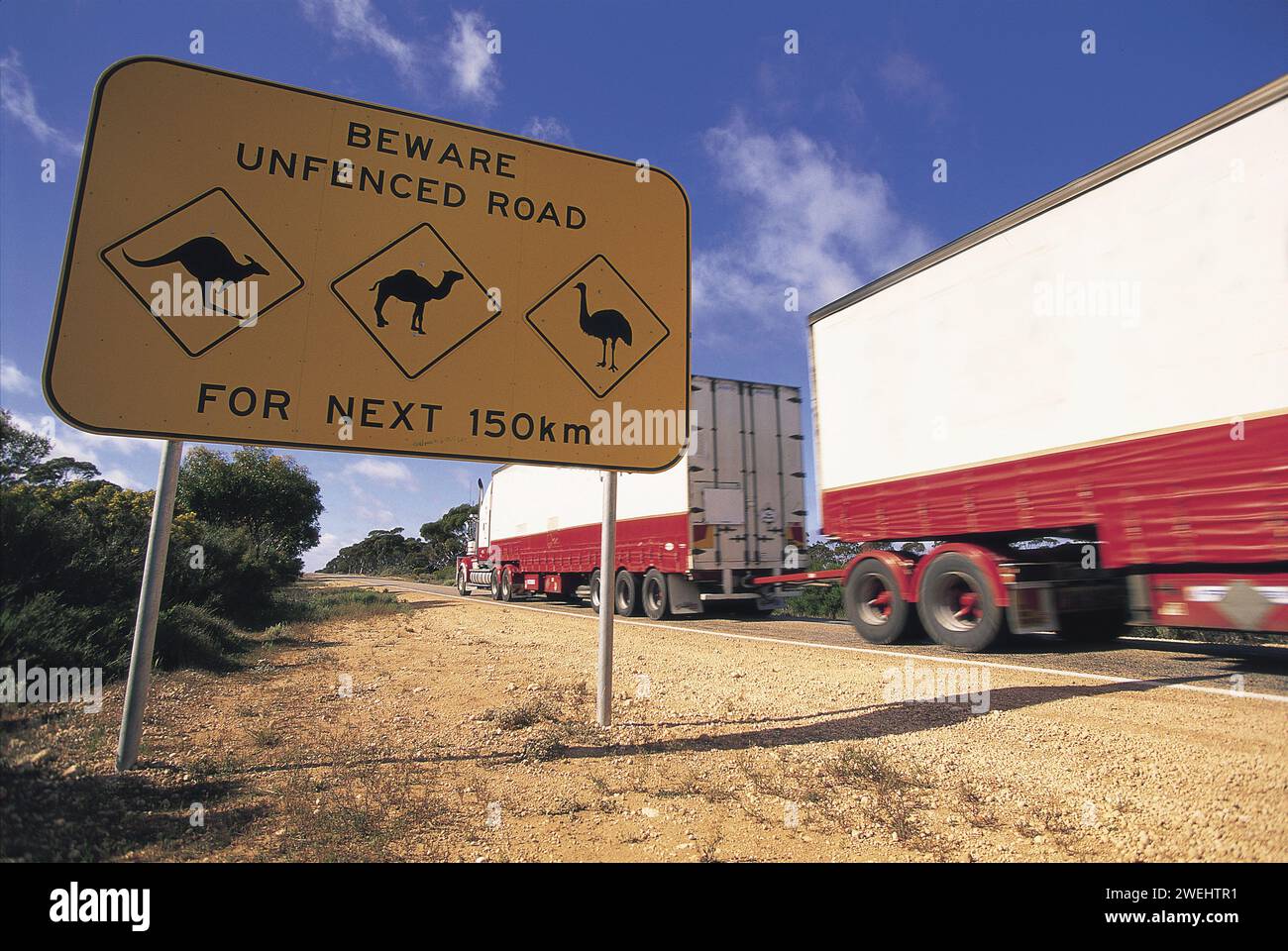 Warning wildlife sign along an unfenced section of a road in outback ...