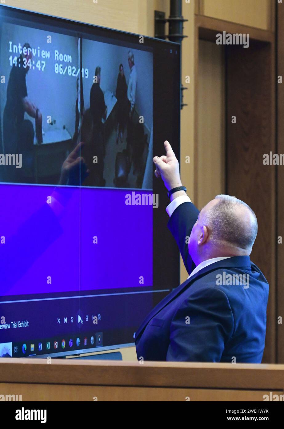 Retired Connecticut State Police Detective John Kimball points to the ...