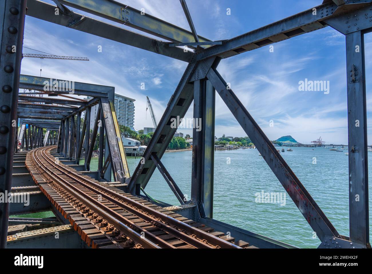Tauranga Railway Bridge across harbour between downtown and Matapihi ...