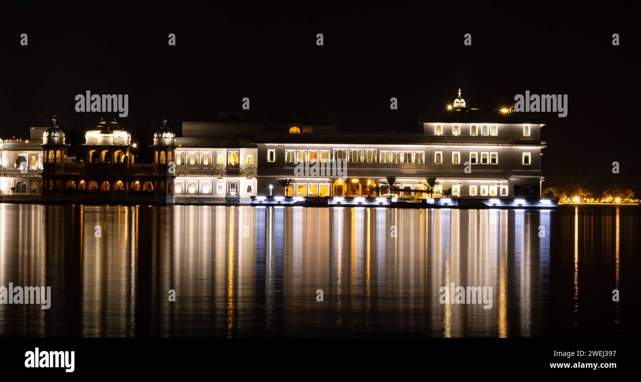 Taj Lake Palace long exposure shot with light reflection at night image ...
