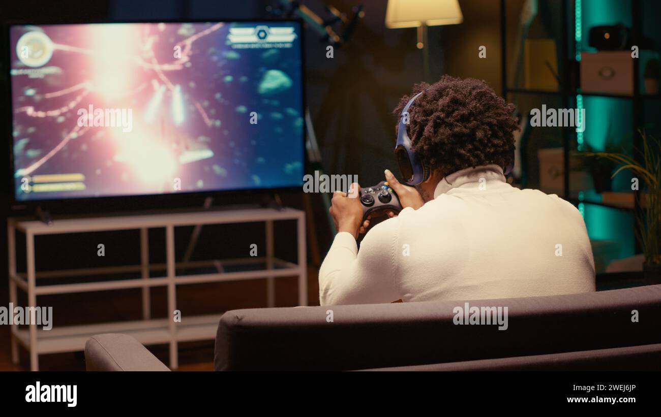 Livid gamer raging in frustration after losing mission while playing ... Livid gamer raging in frustration after losing mission while playing ...