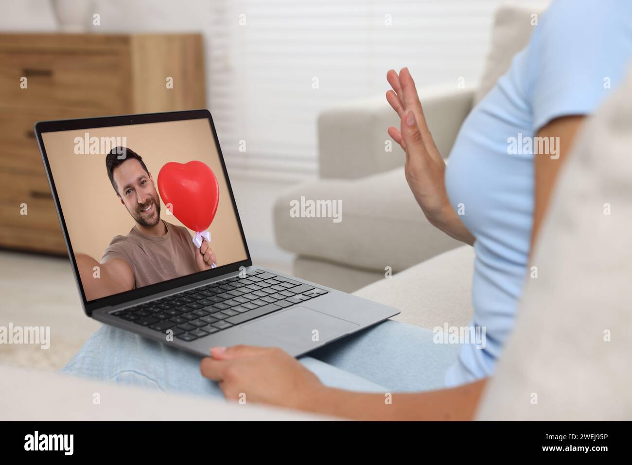 Long distance love. Woman having video chat with her boyfriend via ...