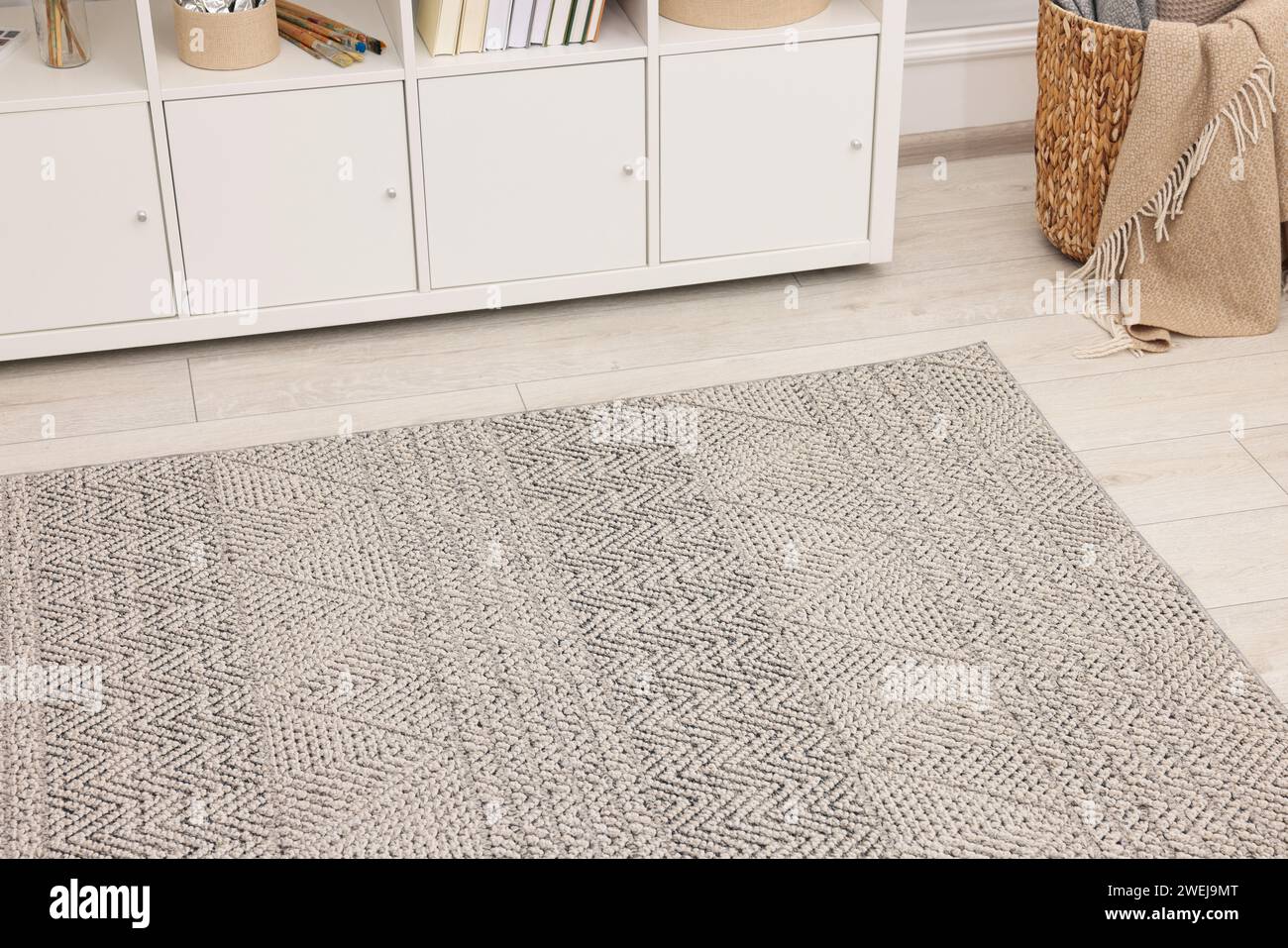 Stylish rug and furniture in room. Interior design Stock Photo - Alamy