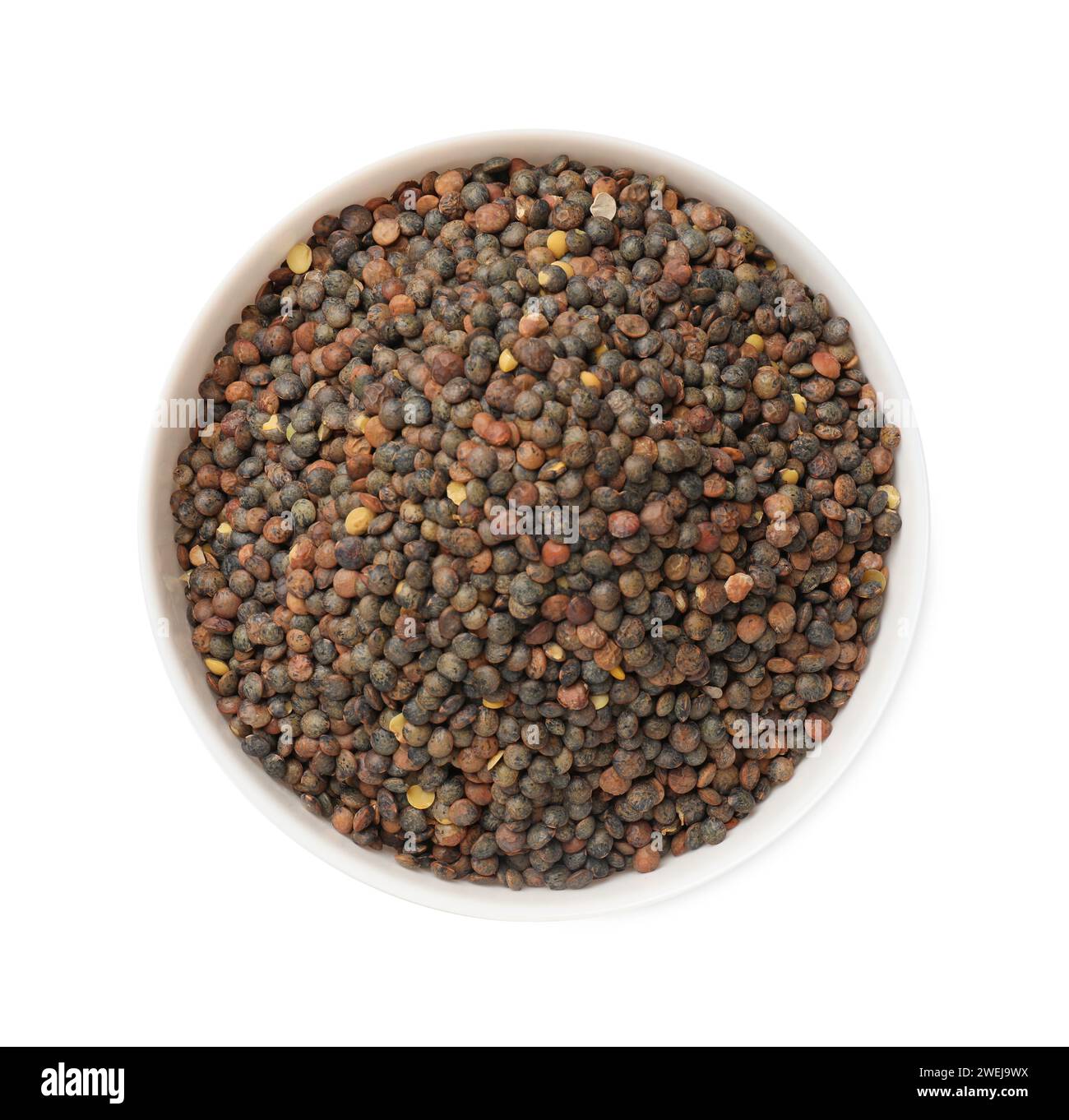 Raw lentils in bowl isolated on white, top view Stock Photo - Alamy