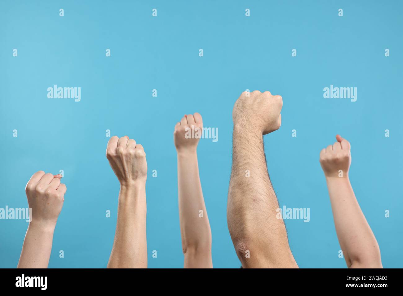 Hands people clenched fists on hi-res stock photography and images - Alamy