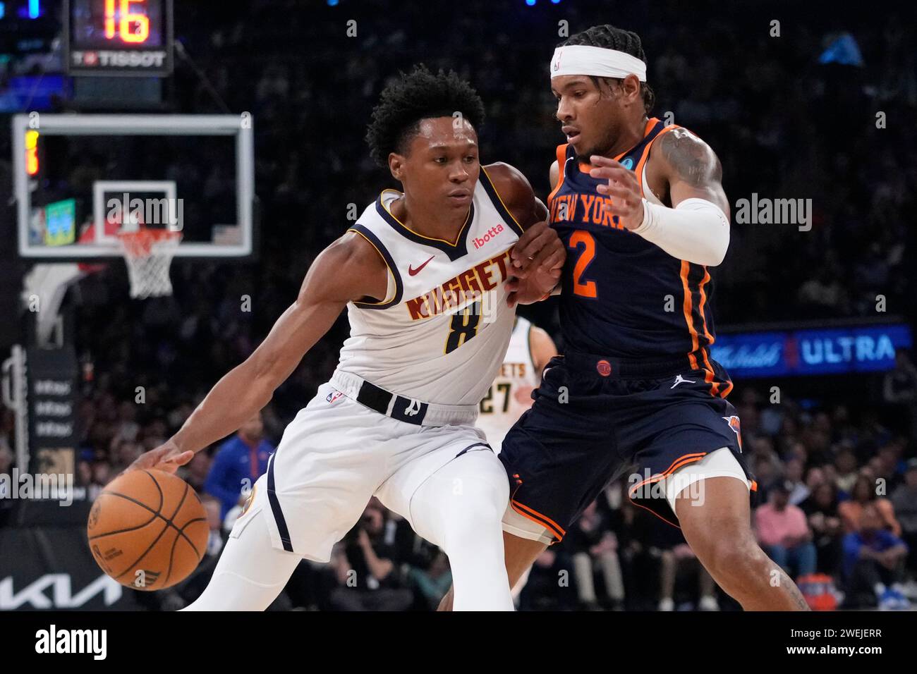 Denver Nuggets forward Peyton Watson (8) drives against New York Knicks ...