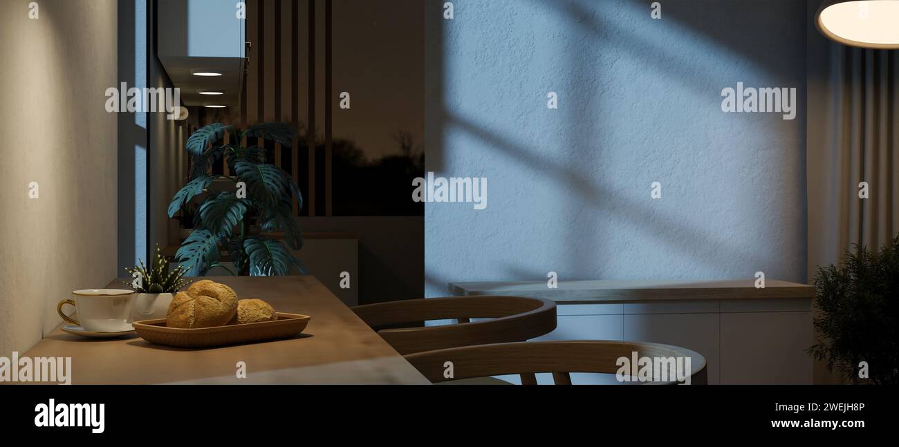 A side-view image of a dining table against the wall in a dining room ...