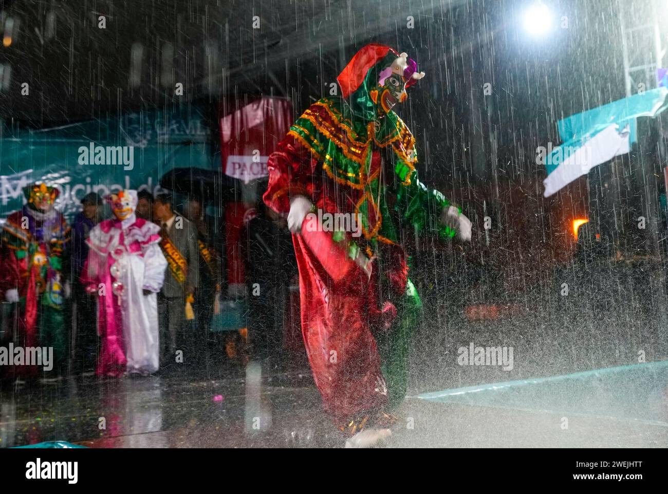 A contestant dressed as the Carnival character Pepino shows off his ...
