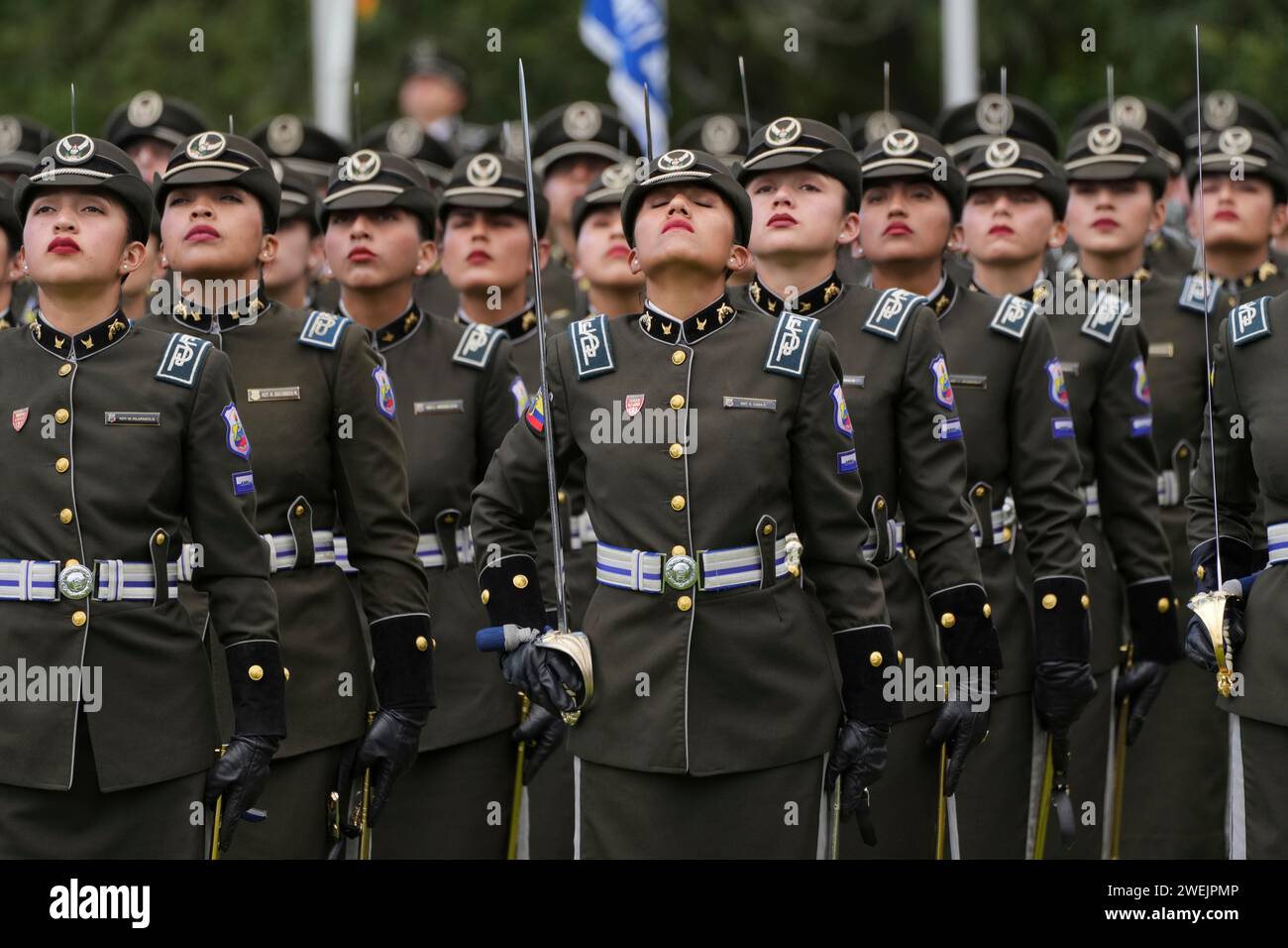 Police stand for a moment of silence for the country's victims of ...