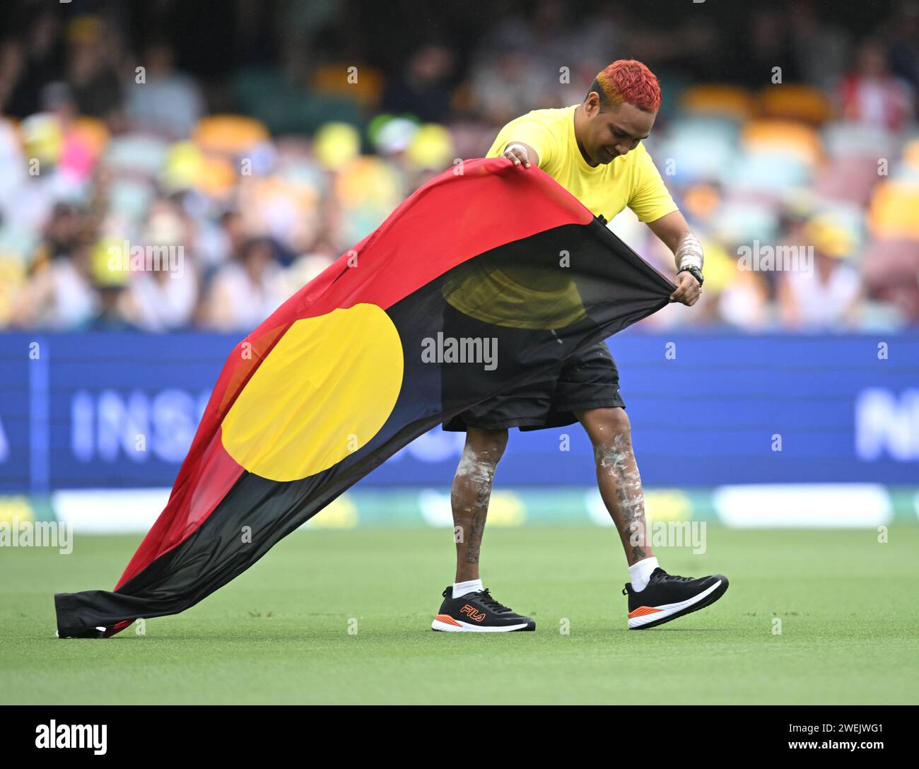 Brisbane, Australia. 26th Jan, 2024. A pitch invader carrying a ...