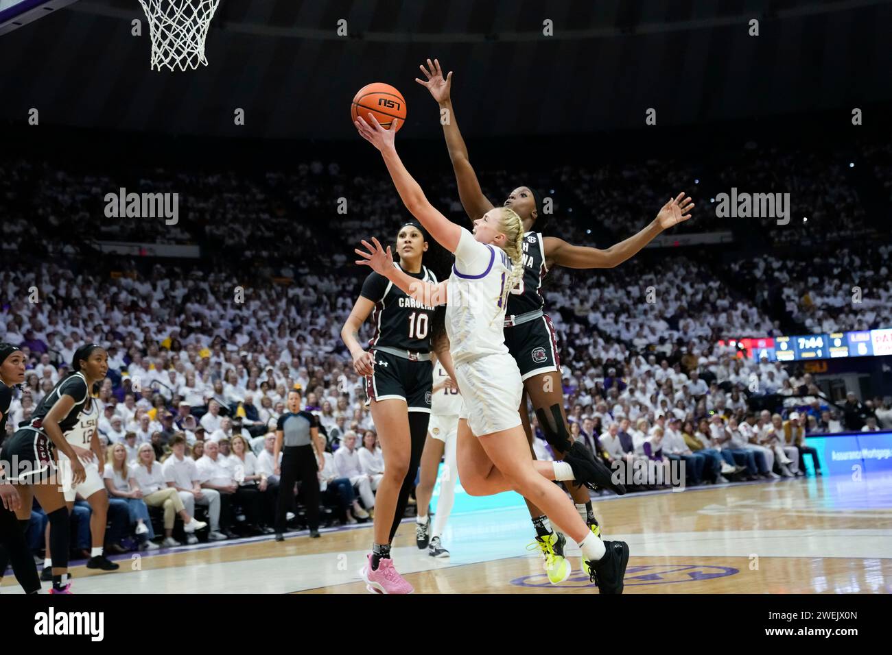 LSU guard Hailey Van Lith (11) goes to the basket in the first half an ...