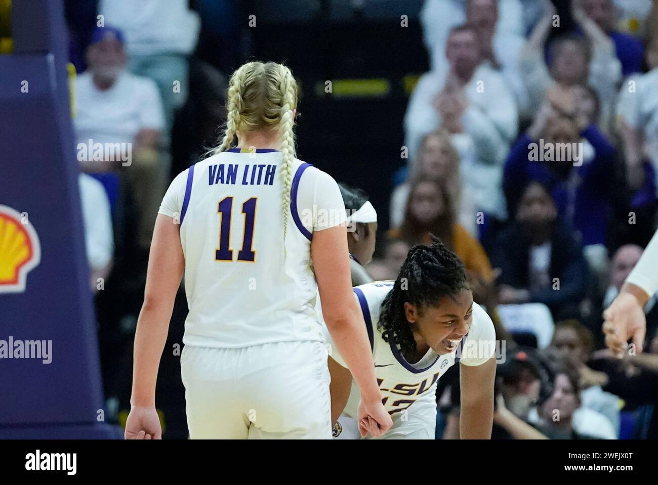 LSU guard Mikaylah Williams (12) reacts with guard Hailey Van Lith (11 ...