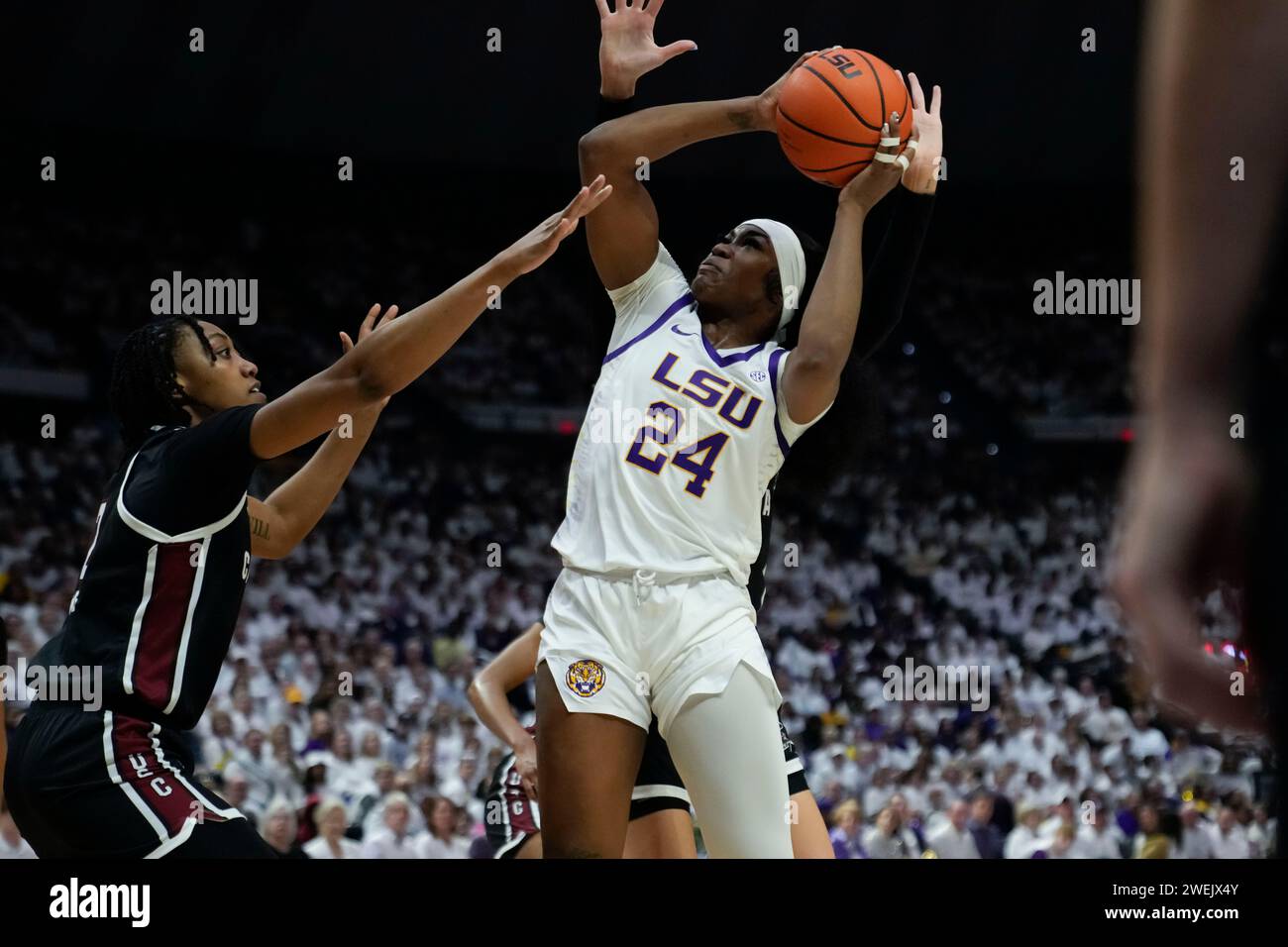 LSU guard Aneesah Morrow (24) goes to the basket in the first half an ...