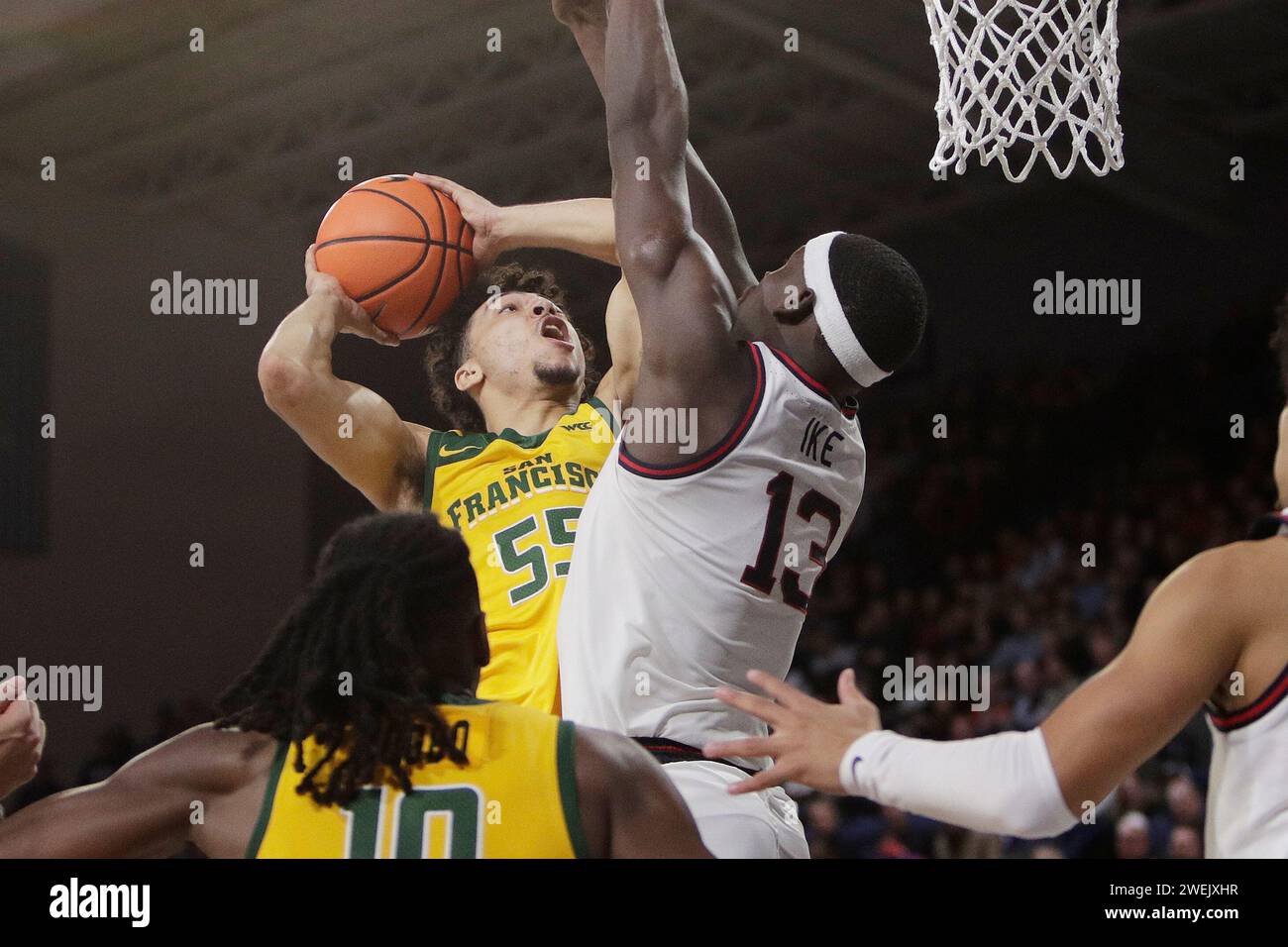 San Francisco guard Marcus Williams (55) shoots as Gonzaga forward ...