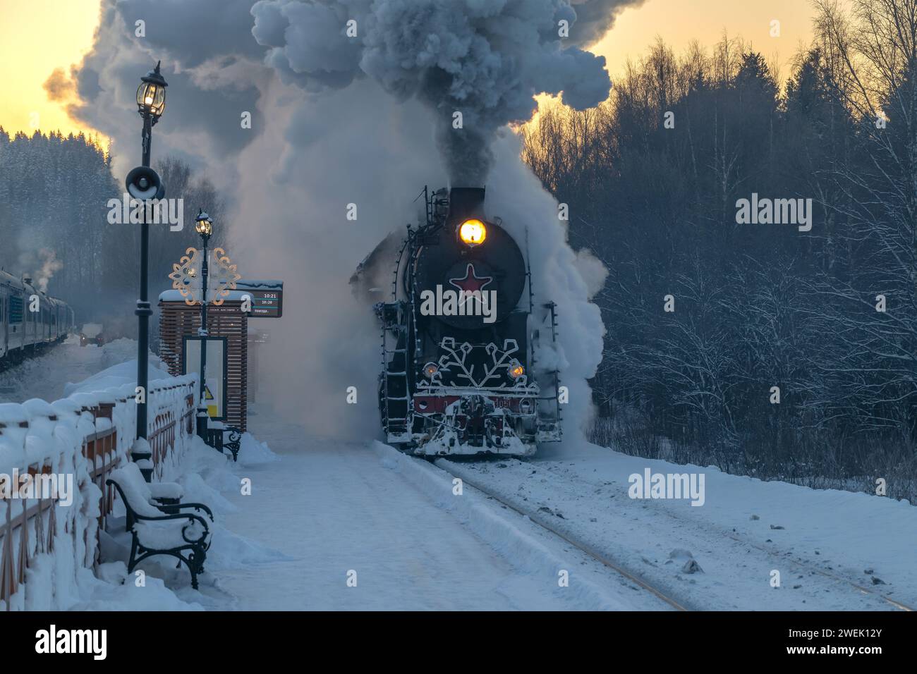 RUSKEALA, RUSSIA - JANUARY 20, 2024: An old steam locomotive arrives at ...