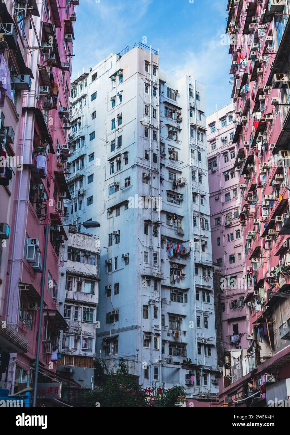An aerial view of a cityscape featuring two large buildings with ...