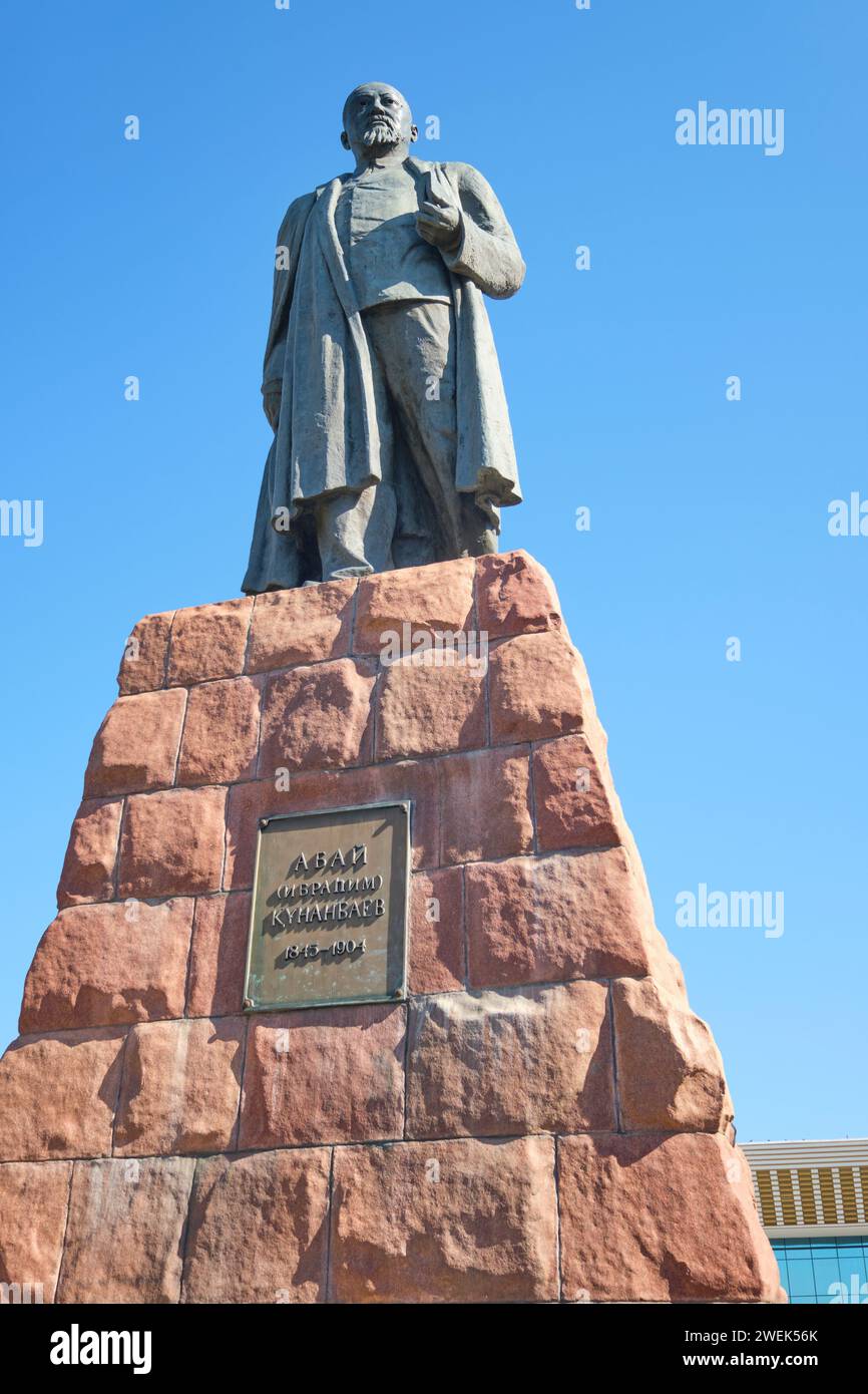 A statue of the famous poet, Abai, on a stone pedestal in the plaza in ...