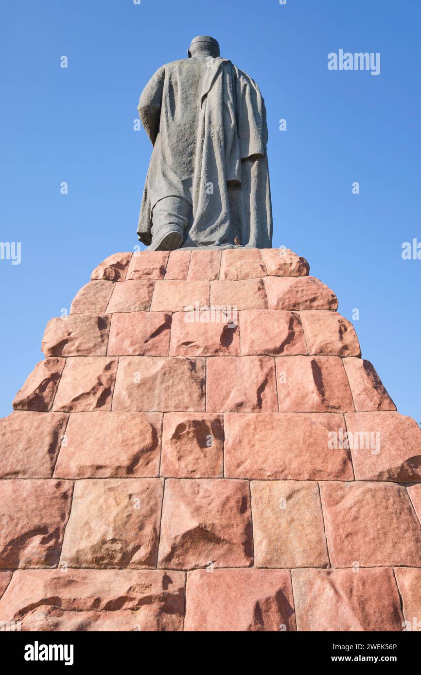 A statue of the famous poet, Abai, on a stone pedestal in the plaza in ...