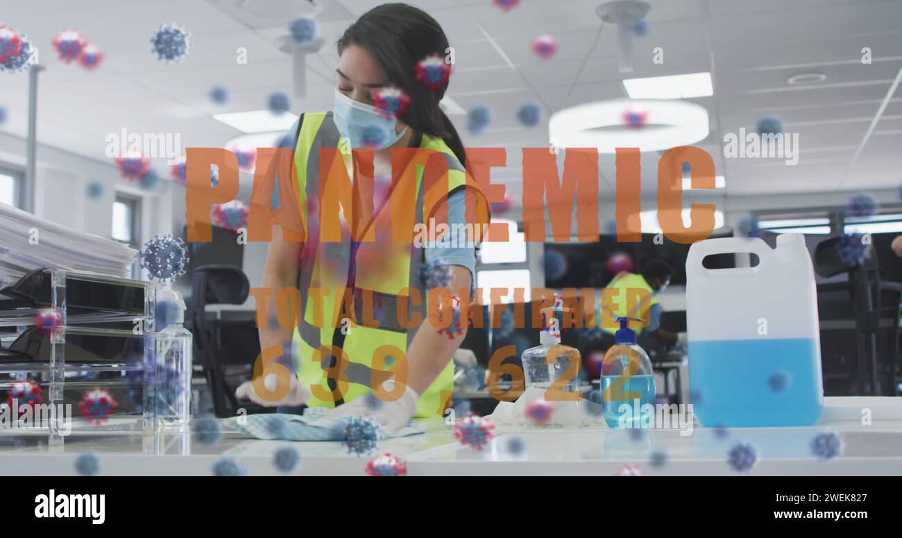Image of word pandemic and covid-19 cells floating with work colleagues ...