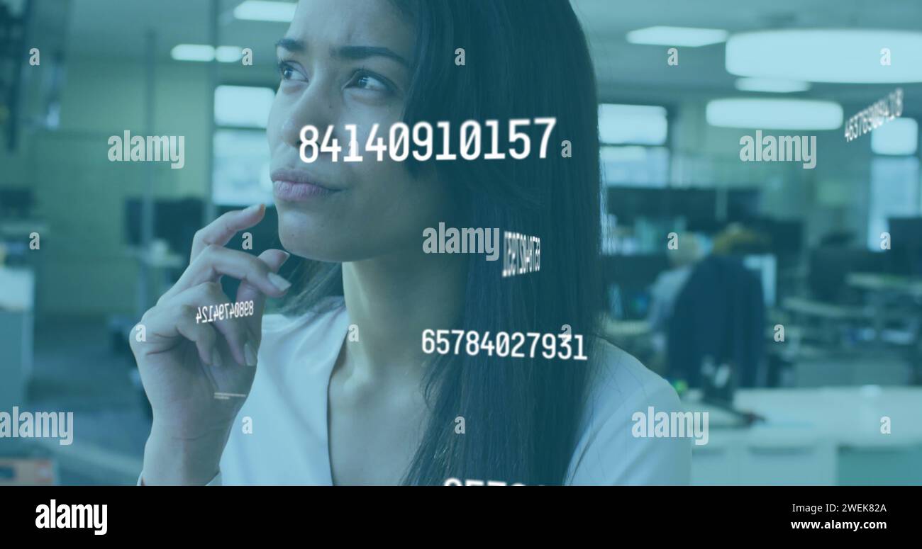 Image of floating numbers with woman working in an office Stock Photo ...