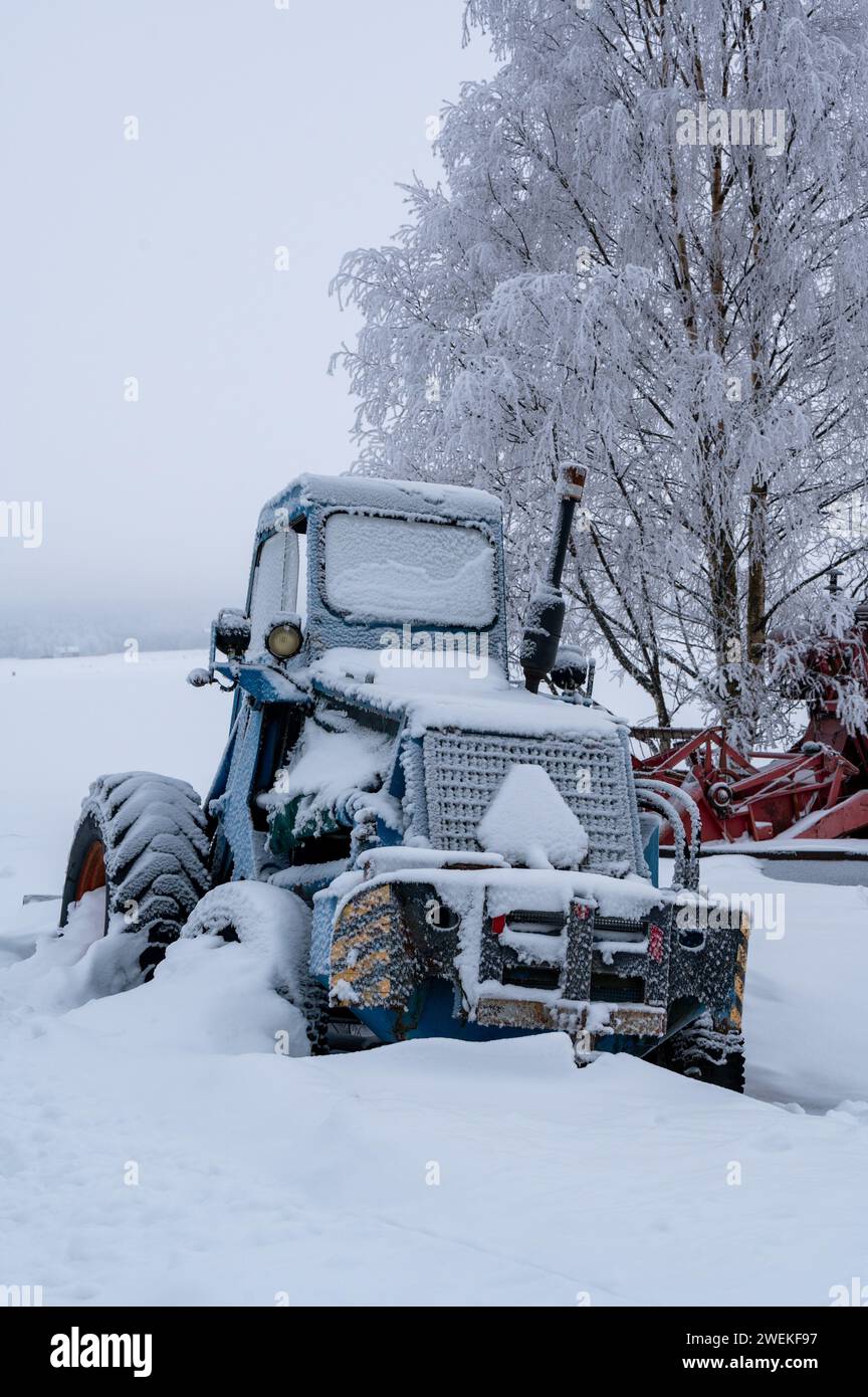 Old blue powerful farming machin backhoe loader Stock Photo - Alamy