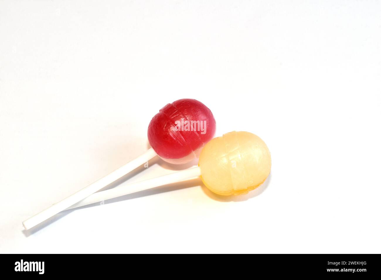 Round candies on sticks hi-res stock photography and images - Alamy