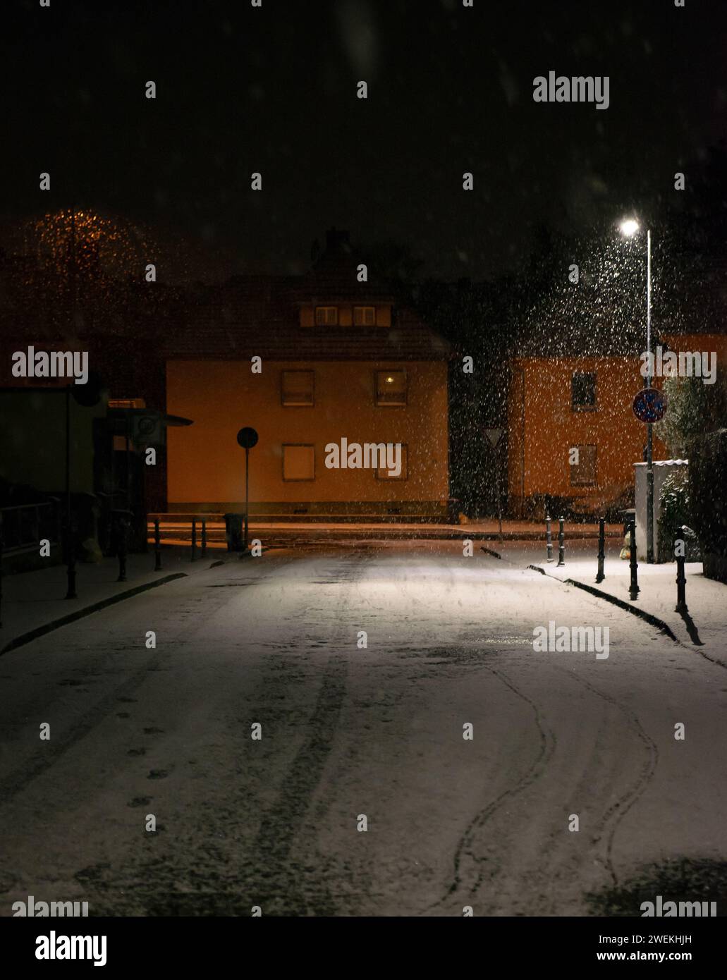 Blurred background. City view, lights, falling snow, night, street ...