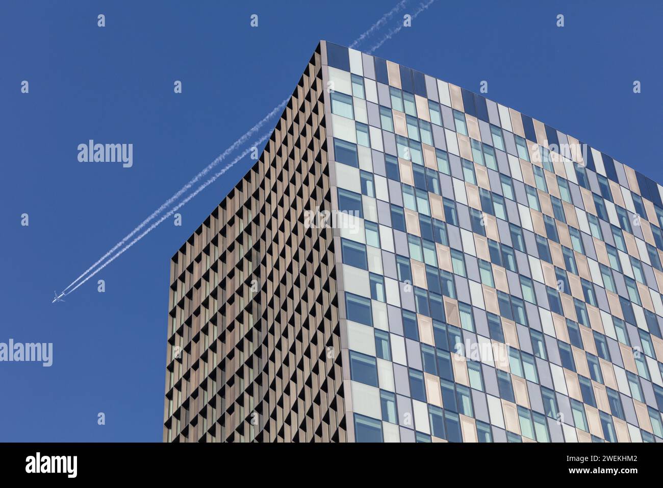 The Blade residential tower with a plane flying over Manchester. Part ...