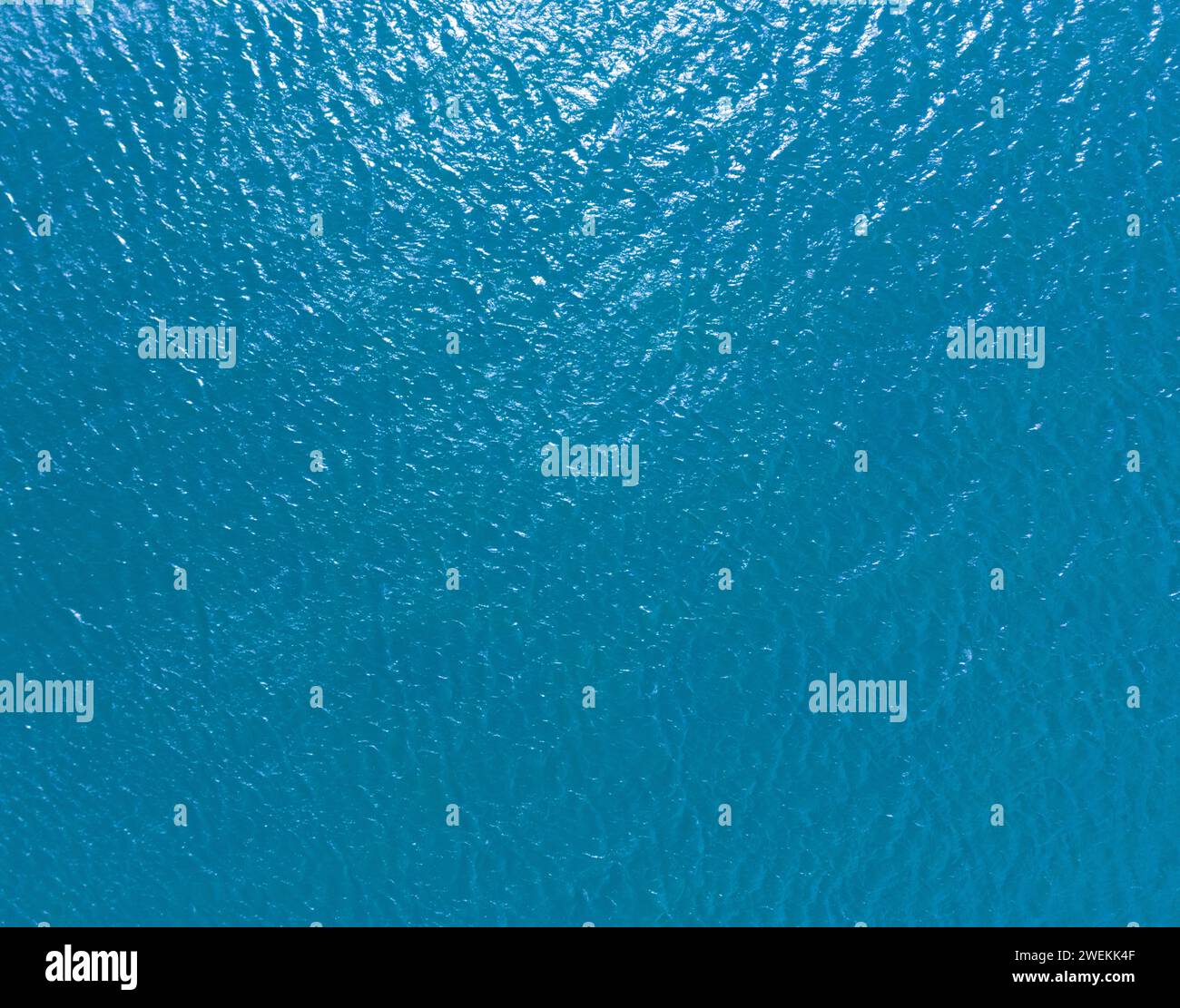 Aerial view of a crystal clear sea water texture. View from above ...