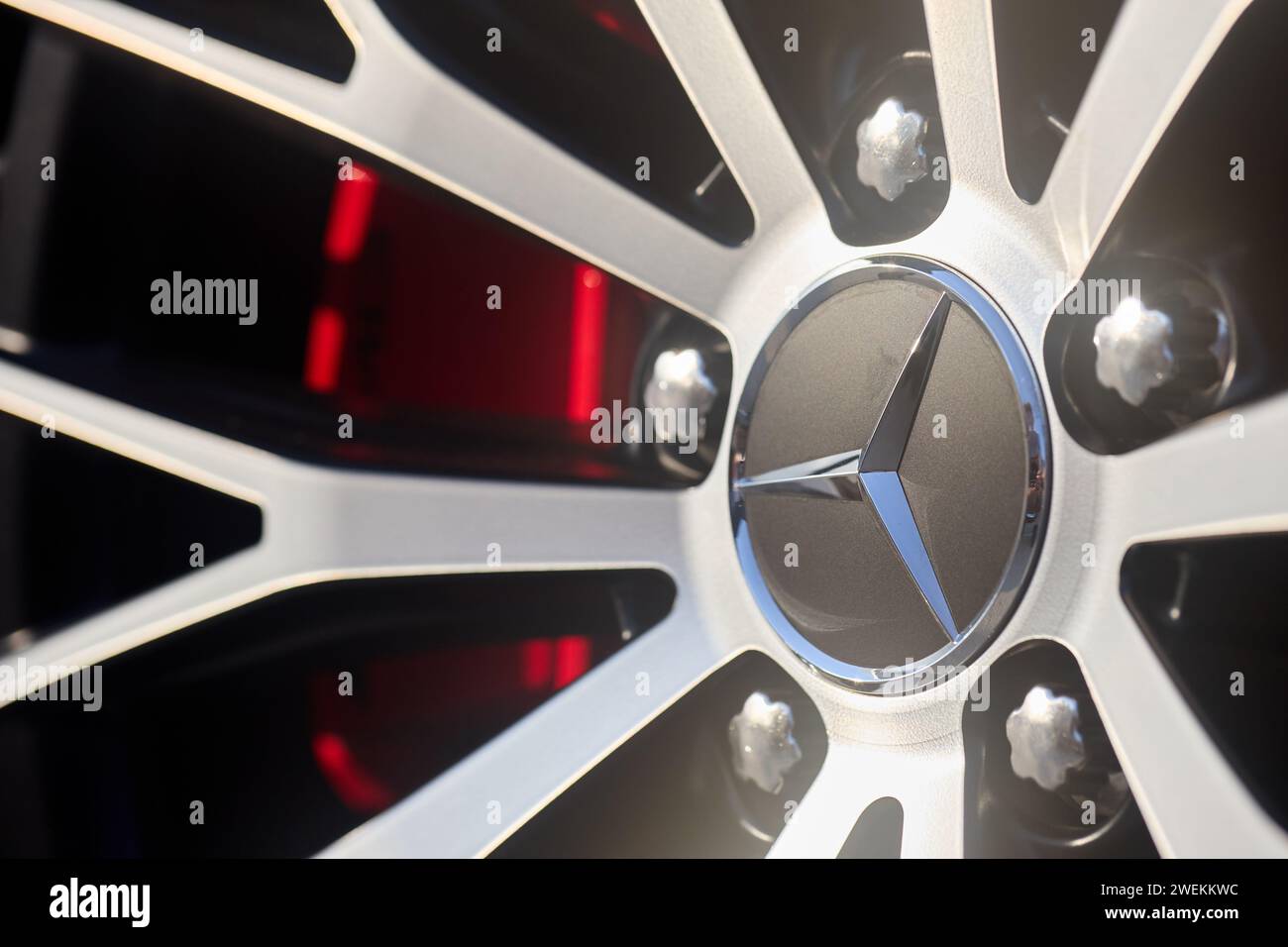 Berlin, Germany - August 20, 2022: Mercedes-Benz AMG alloy wheel plug ...