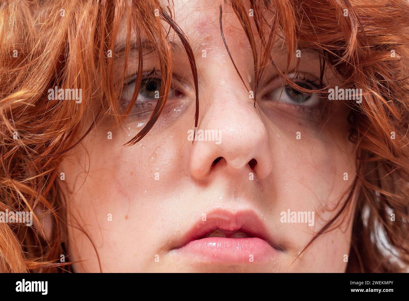 teenage girl with red hair is crying in her room. Emotion management ...