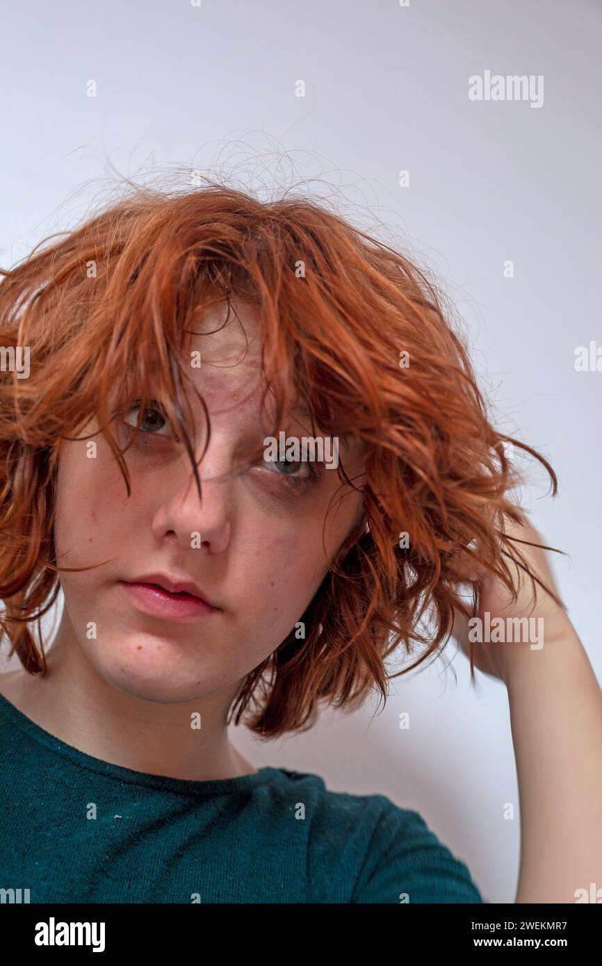 t teenage girl with red hair is crying in her room. Emotion management ...