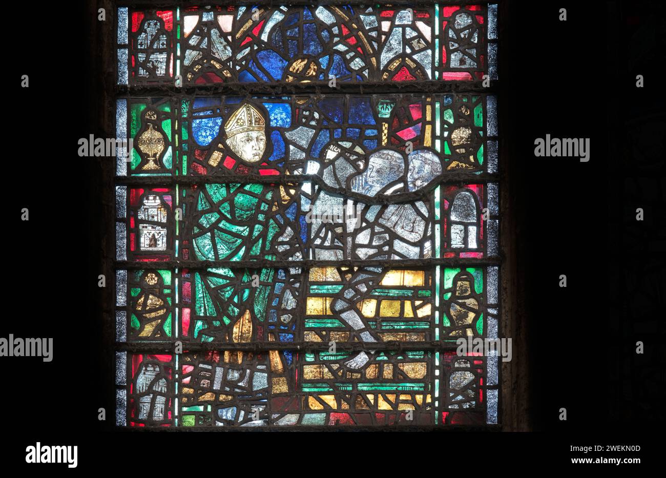 Medieval stained glass window of a bishop in the cathedral at York ...