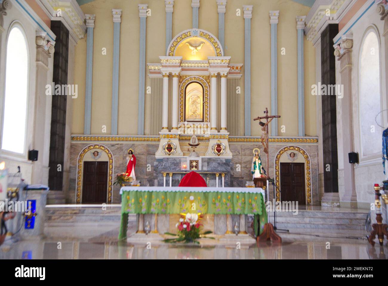 Statue of Virgin Mary on the altar at the ruins of Oslob (Museo Oslob ...
