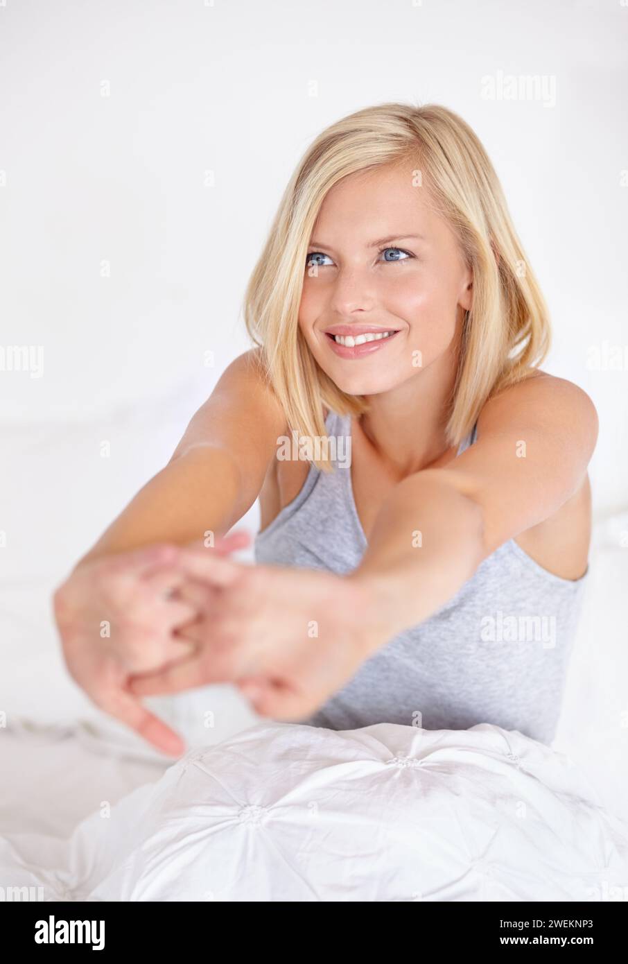 Happy, woman and wake up stretching on bed in home with ideas for ...