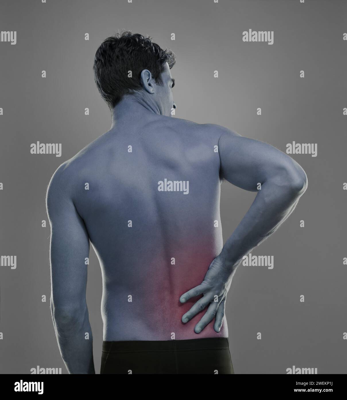 Man, back pain and spine problem in studio, medical crisis and muscle ...