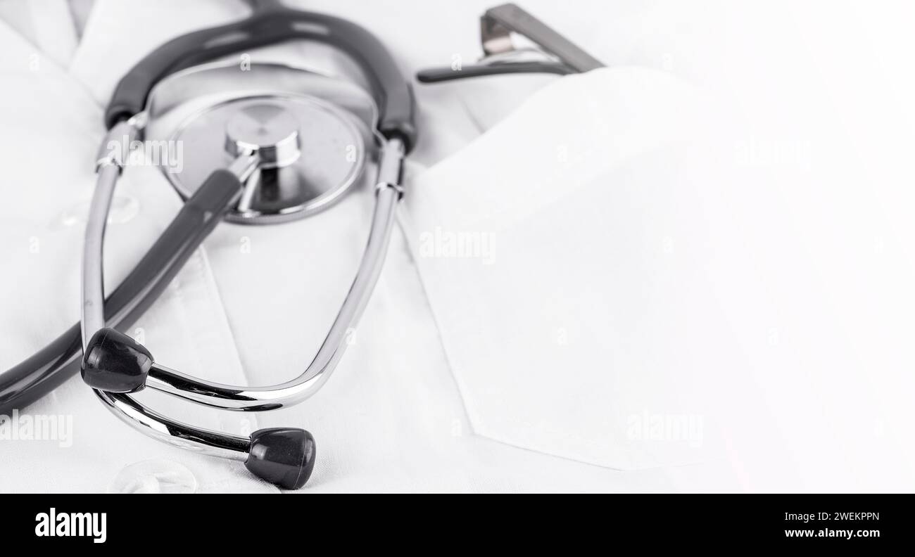 The new white robe doctor and stethoscope on soft sunlight Stock Photo ...